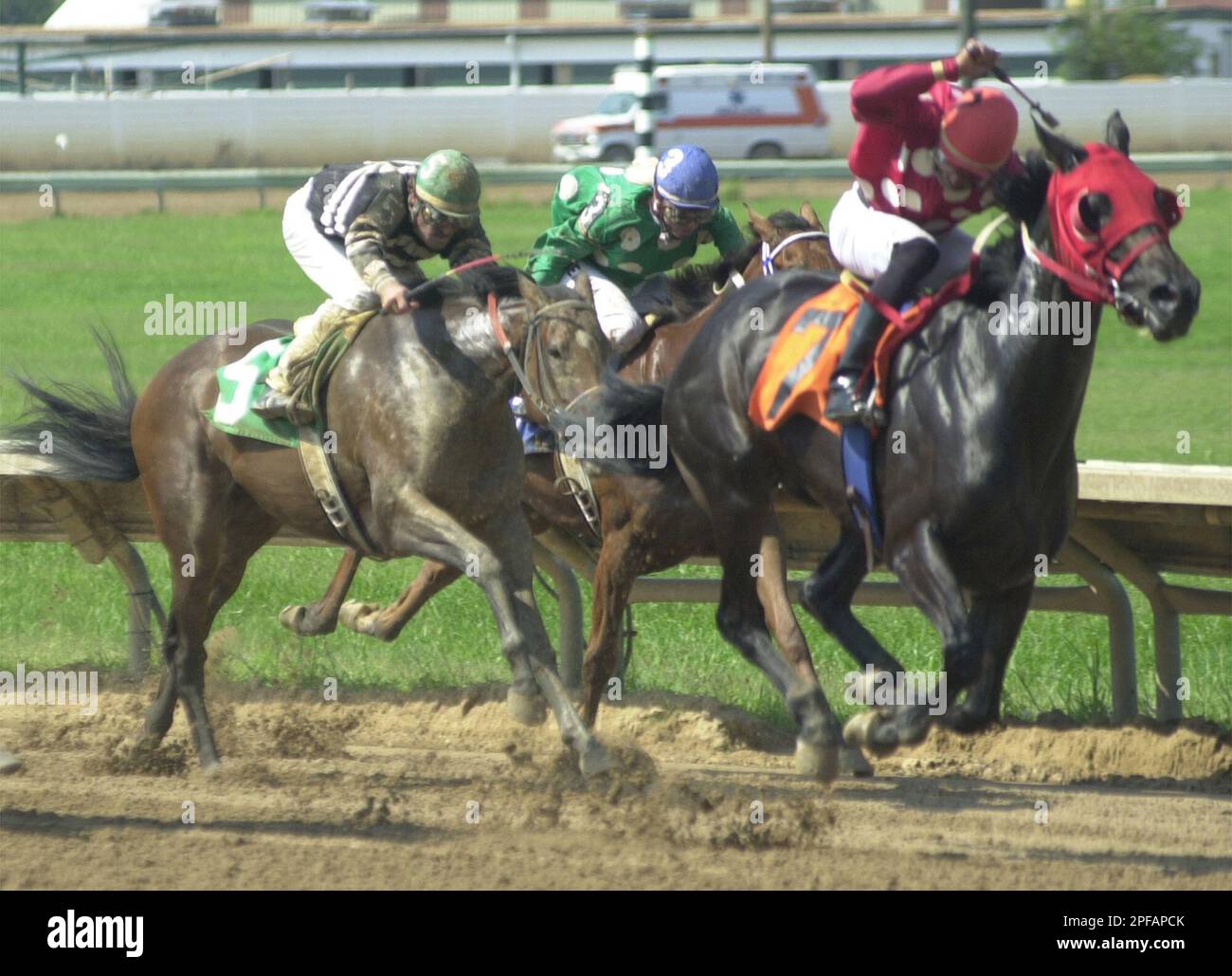 Cindy Medina, in the green silks, races at Fairmont Park Race Track in ...