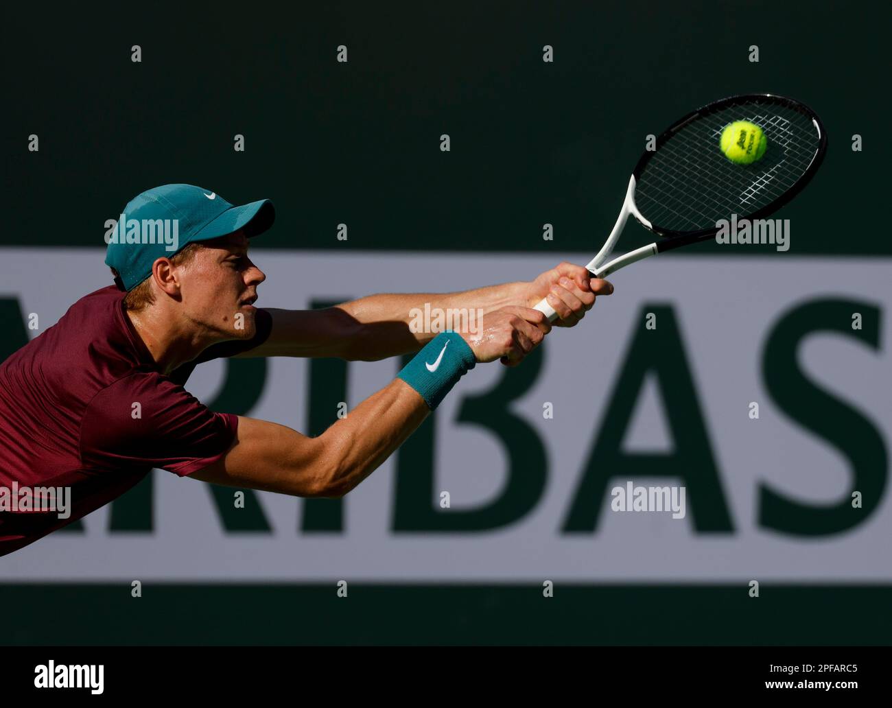 March 16, 2023 Jannik Sinner of Italy returns a shot against Taylor Fritz during the 2023 BNP ...
