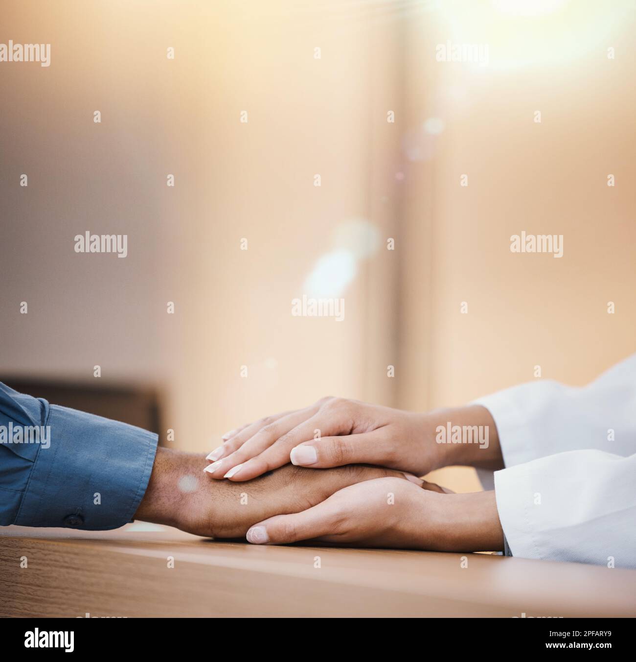 Holding hands, support and health with doctor and patient, cancer ...