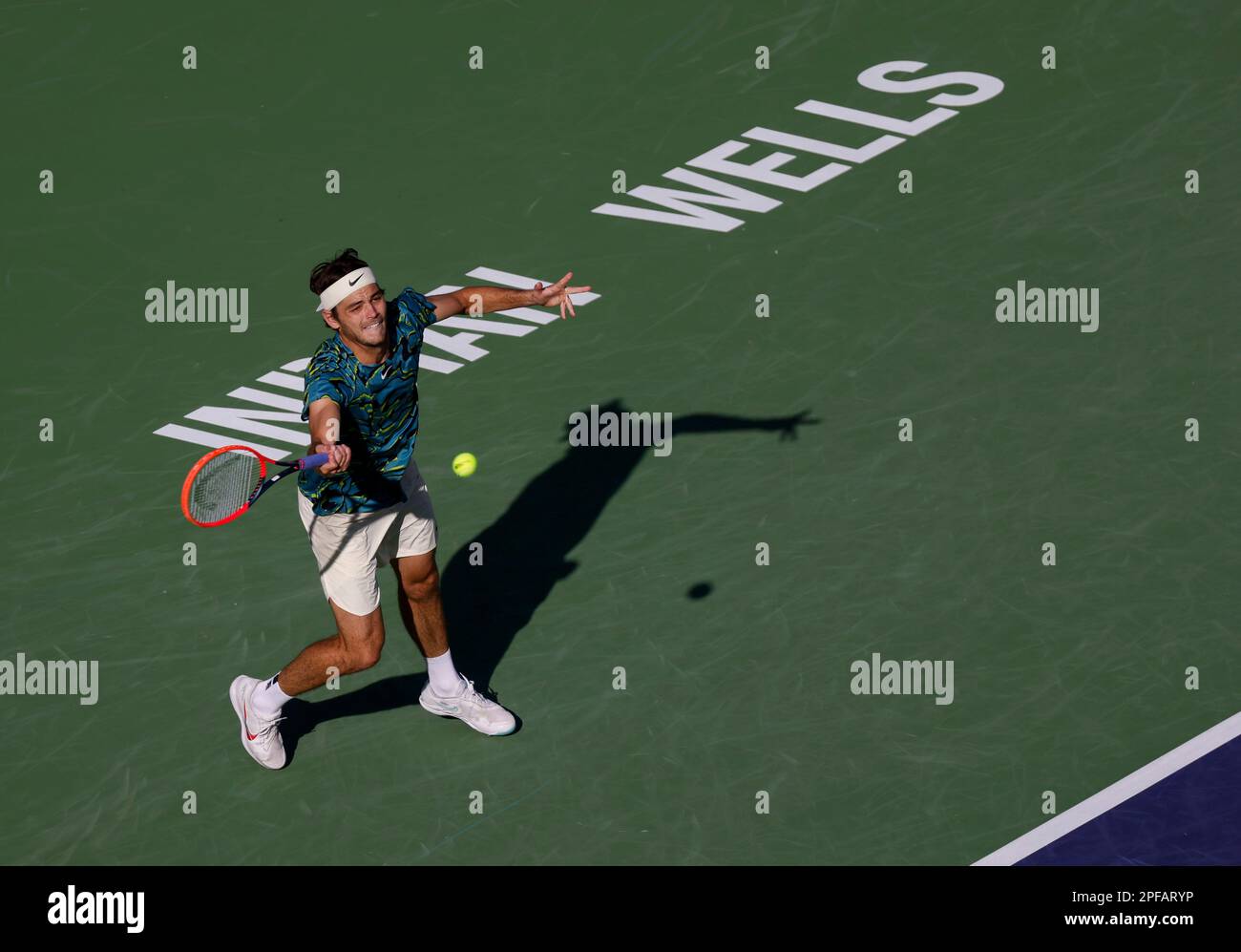 March 16, 2023 Taylor Fritz returns a shot against Jannik Sinner of Italy during the 2023 BNP ...