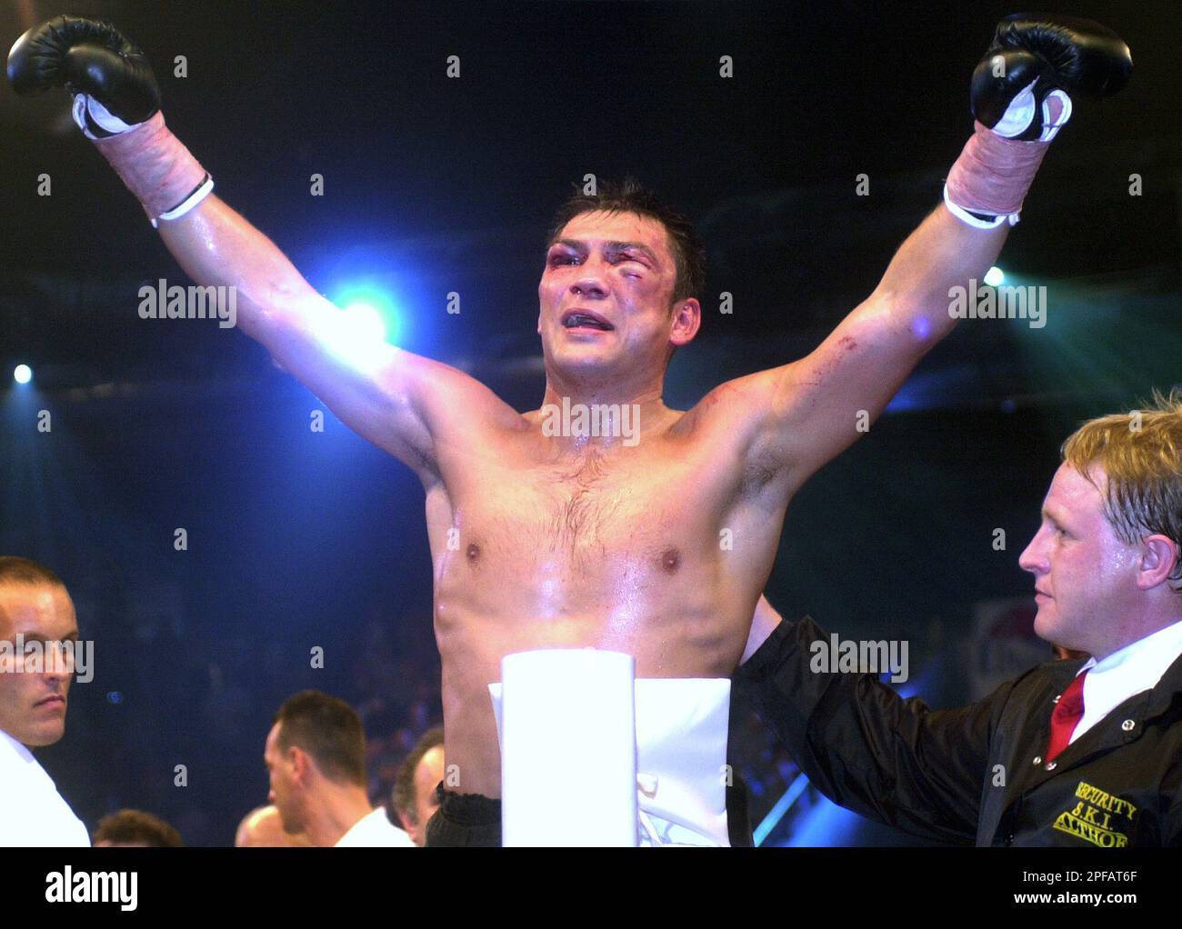 Polish light-heavyweight boxer Dariusz Michalczewski raises his arms ...