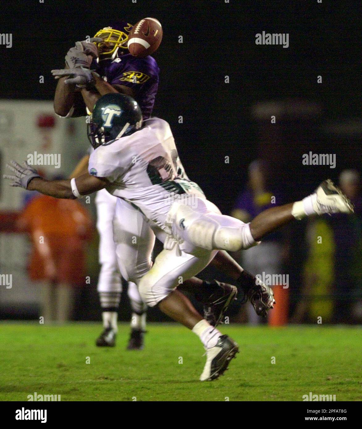 East Carolina's Antwane Yelverton, top, breaks up a pass intended for ...