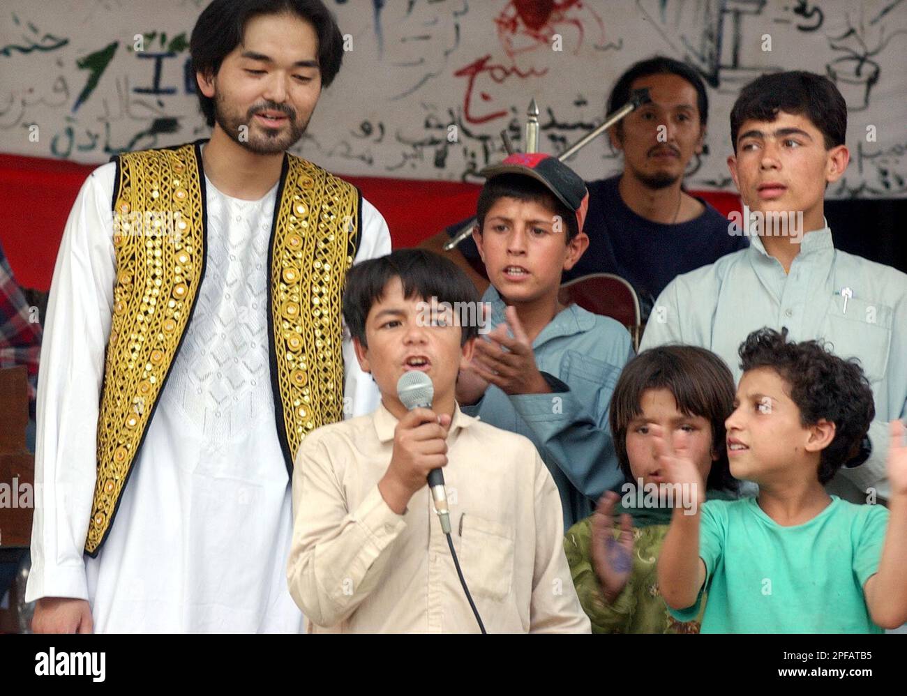 ** ONE OF ELEVEN STAND ALONE PHOTOS ** Sardar Jalaluddin, 12, center ...