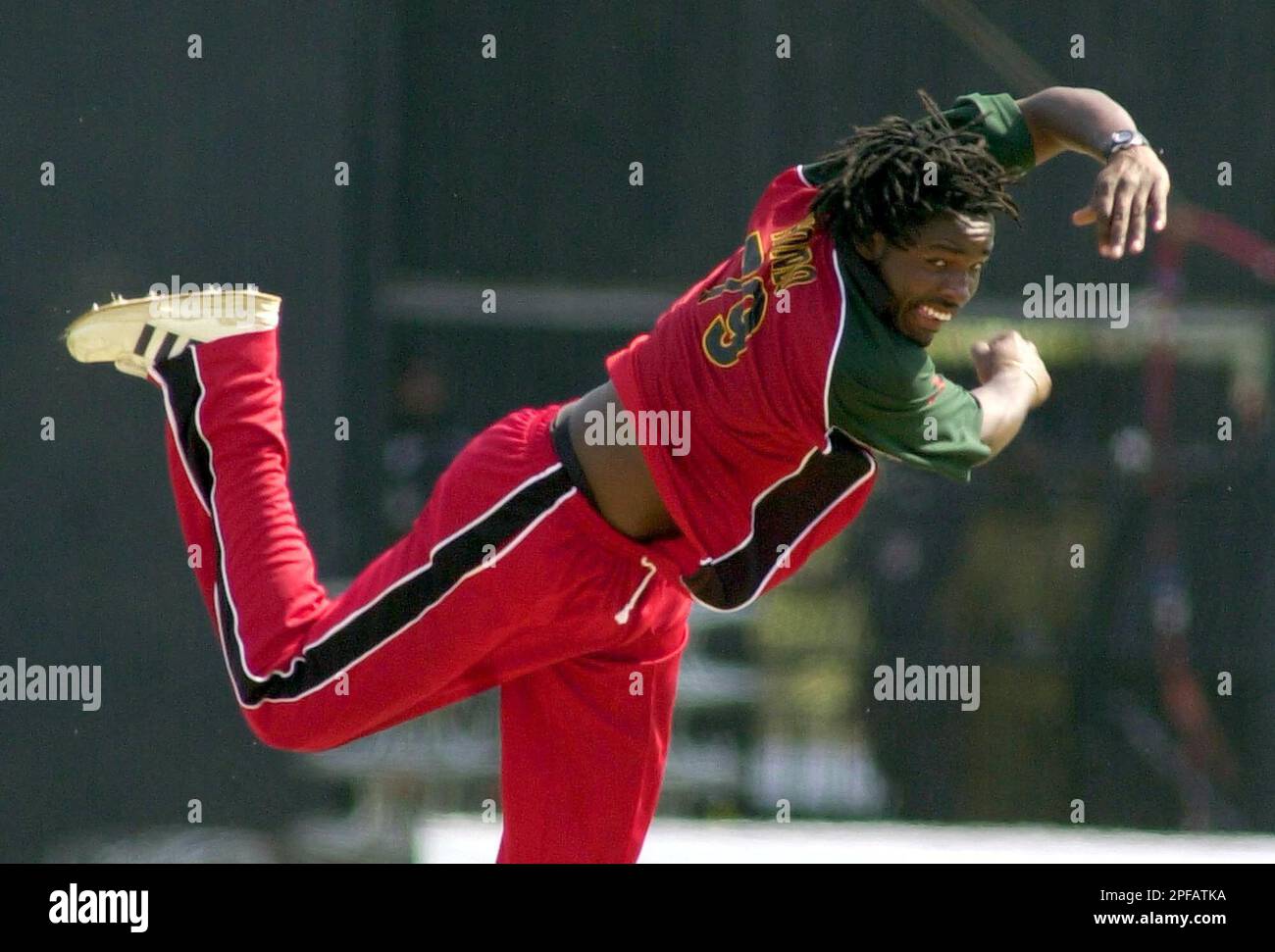 Zimbabwe's Douglas Hondo bowls to Indian Sachin Tendulkar, unseen, in ...