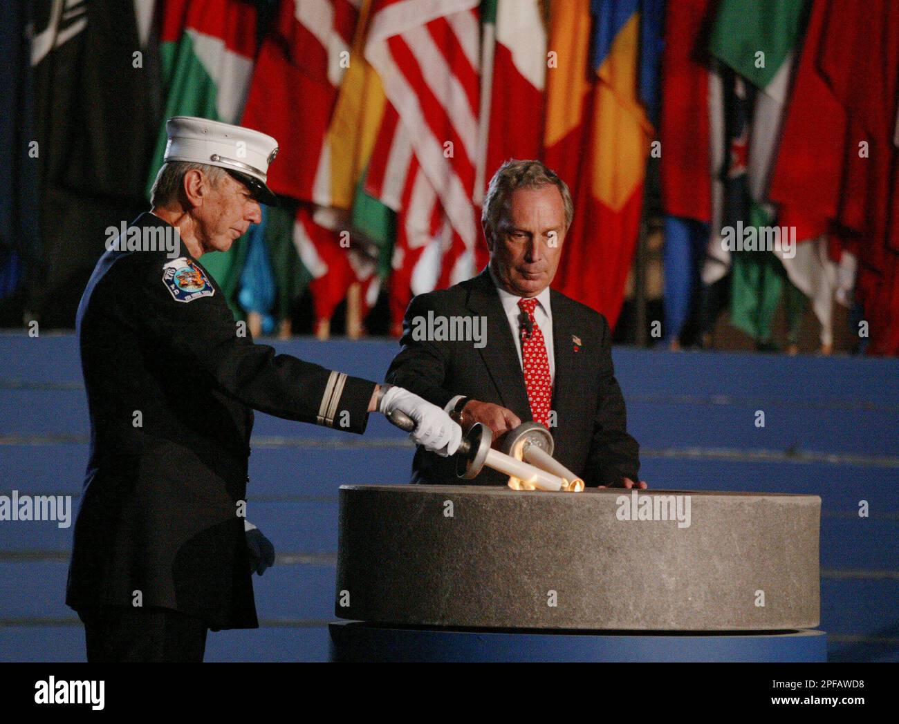 Firefighter John Vigiano, left, and New York Mayor Michael Bloomberg ...