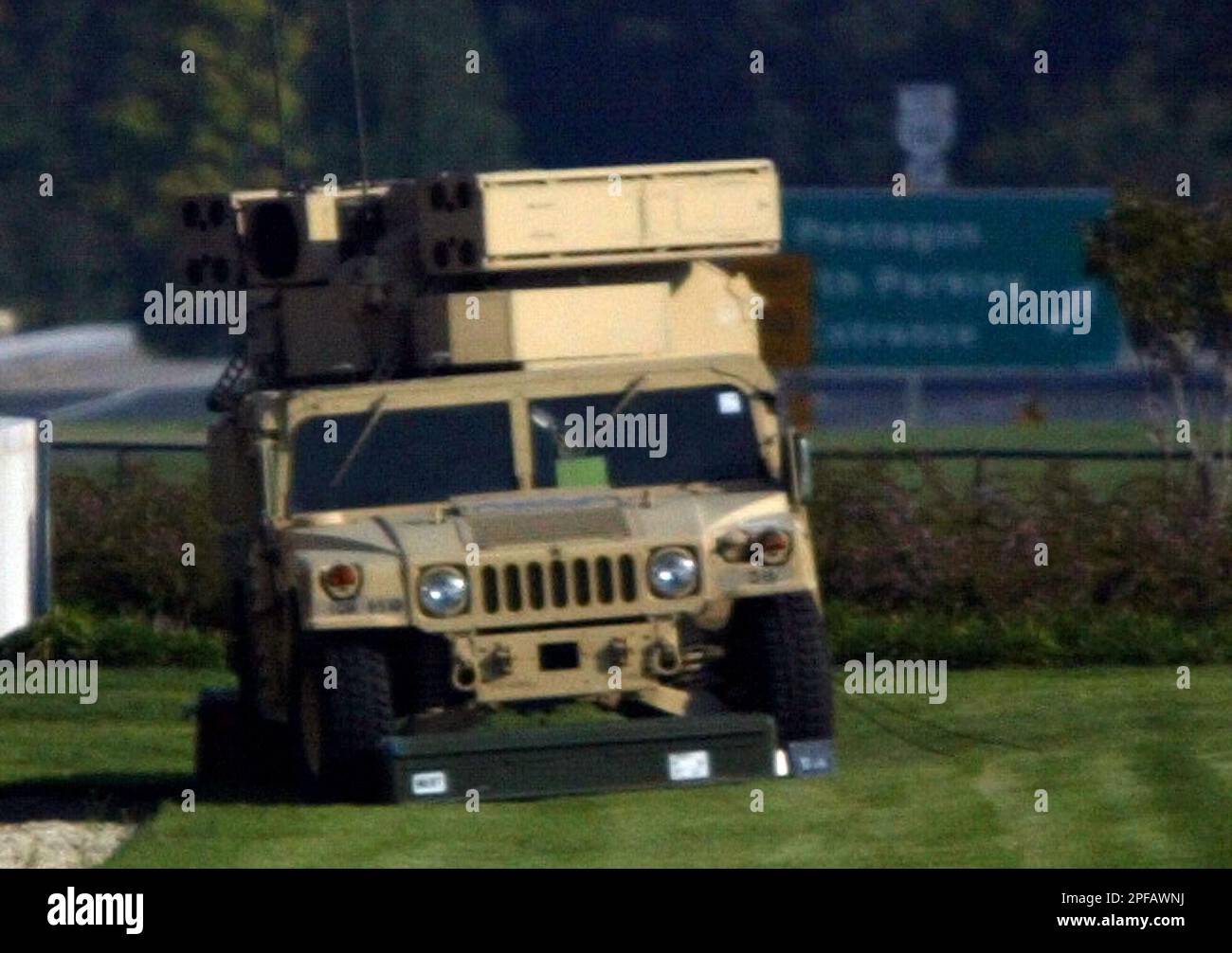 A military Humvee with an Avenger anti-aircraft missile launcher on top ...