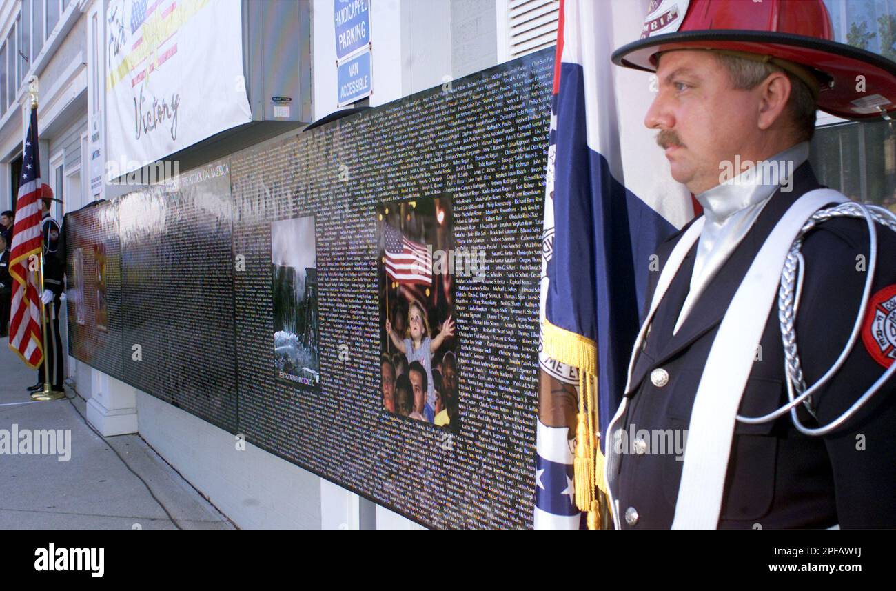 Columbia Fire Department Honor Guard member Bob Atkins stands at the ...