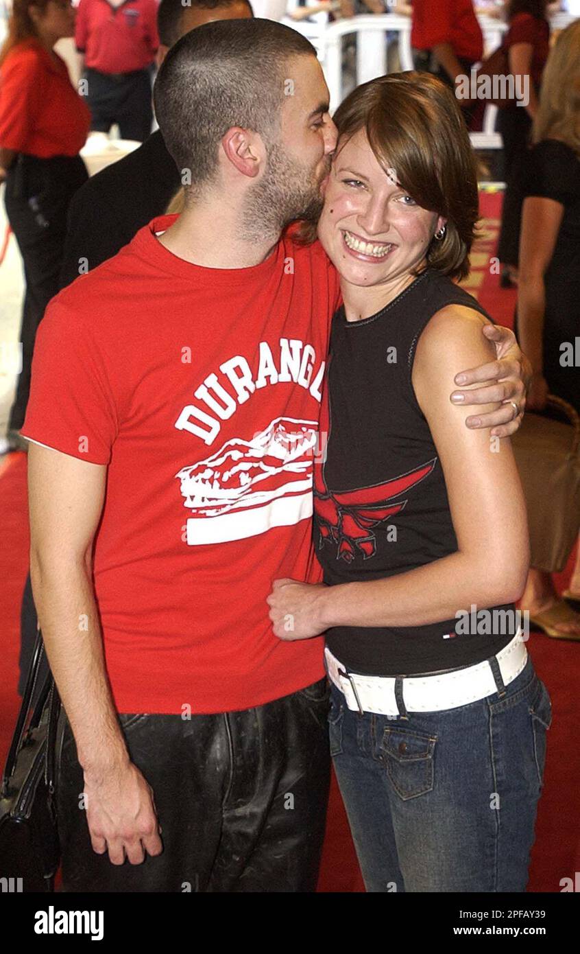 Actor Wes Bentley, left, kisses wife Jennifer Quanz as they arrive at ...