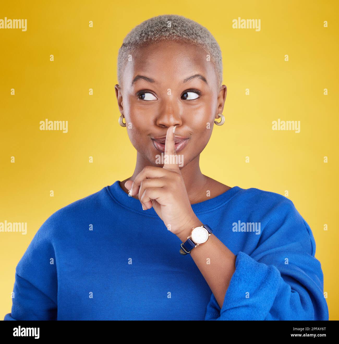 Secret, face and black woman with finger on lips in studio, background ...