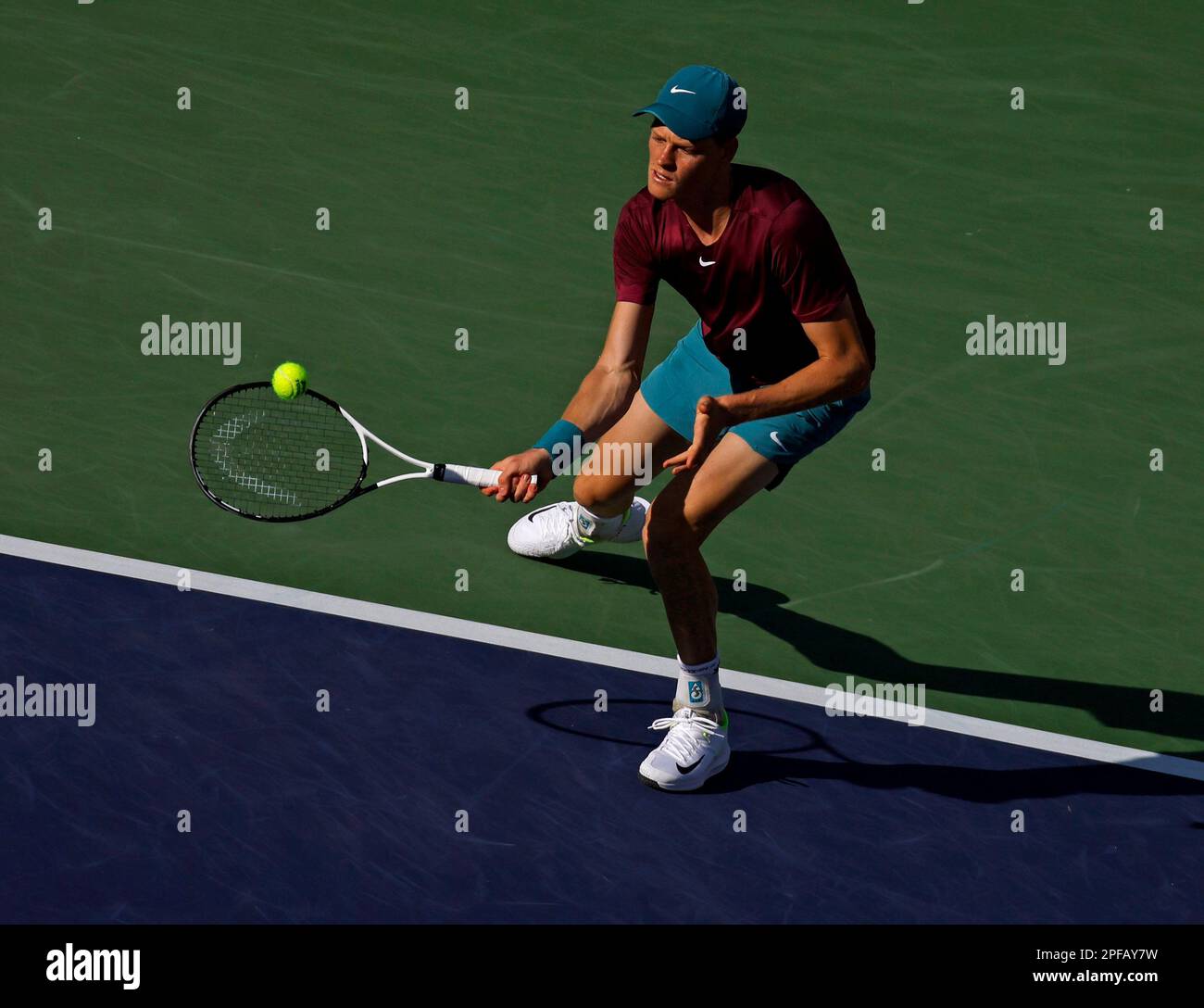 March 16, 2023 Jannik Sinner of Italy returns a shot against Taylor Fritz during the 2023 BNP ...