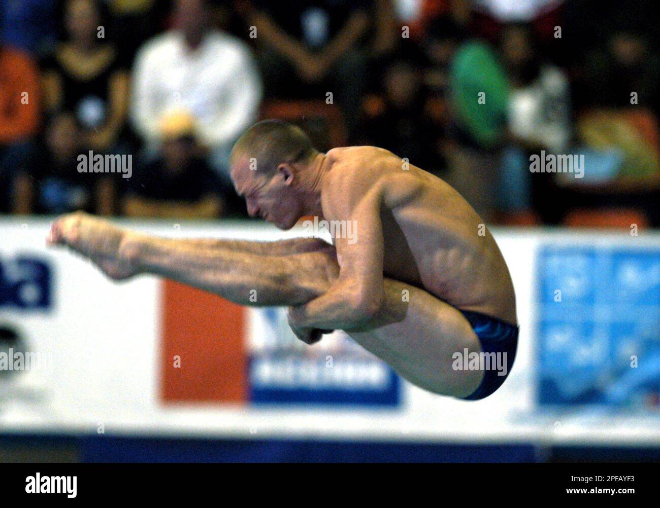 Russia's Dimitri Sautin in action after he jumps from a 3 meter ...