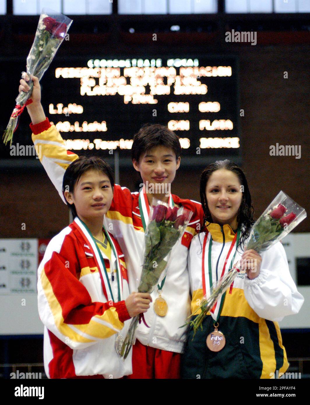 China's Li Na, center, celebrates after winning a gold medal in the 10 ...