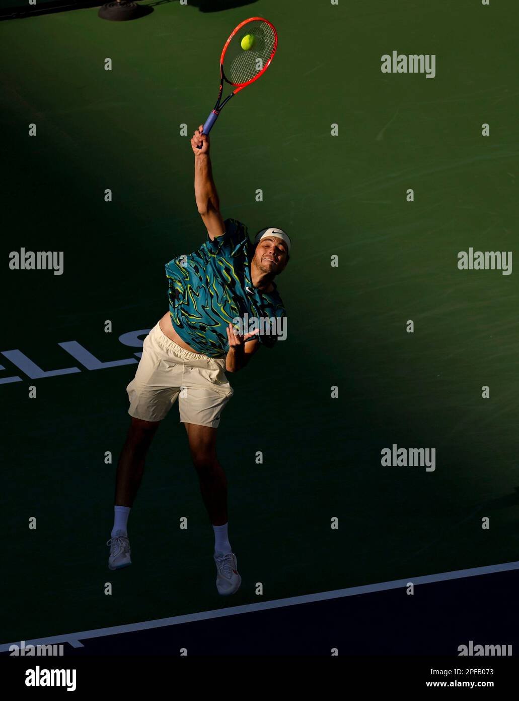 March 16, 2023 Taylor Fritz serves to Jannik Sinner of Italy during the 2023 BNP Paribas Open at ...