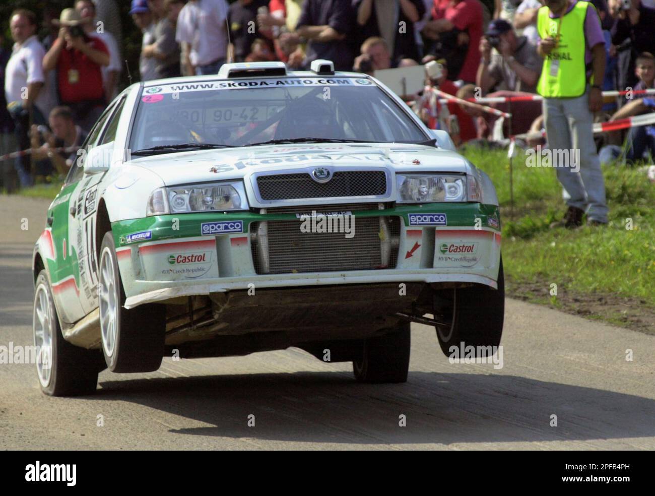 Swedish driver Kenneth Eriksson steers his Skoda Octavia over the rally ...