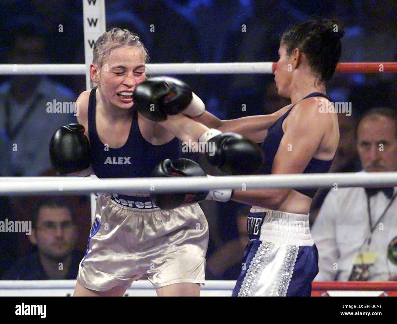 German boxer and defending champion Regina Halmich, left, fights with ...