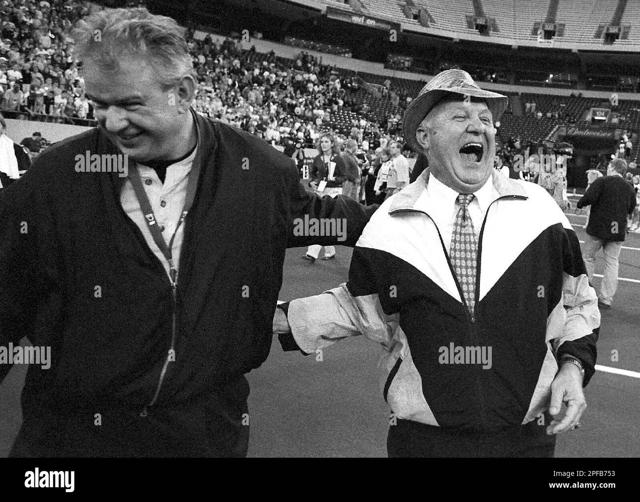 Jasper football Coach Jerry Brewer, right, receives a congratulatory ...