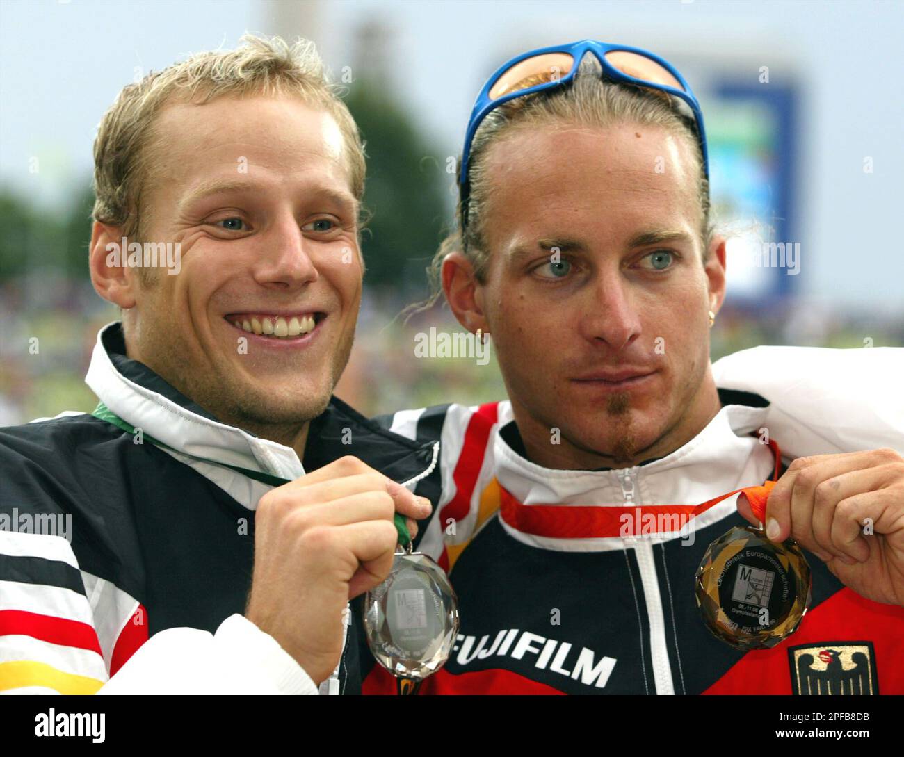 Germany's silver medal winner Lars Borgeling, left, and Tim Lobinger ...