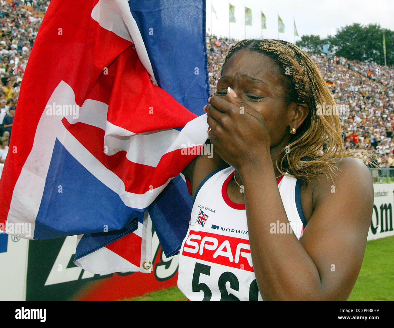 Britain's Ashia Hansen reacts after winning the gold medal in the Women ...