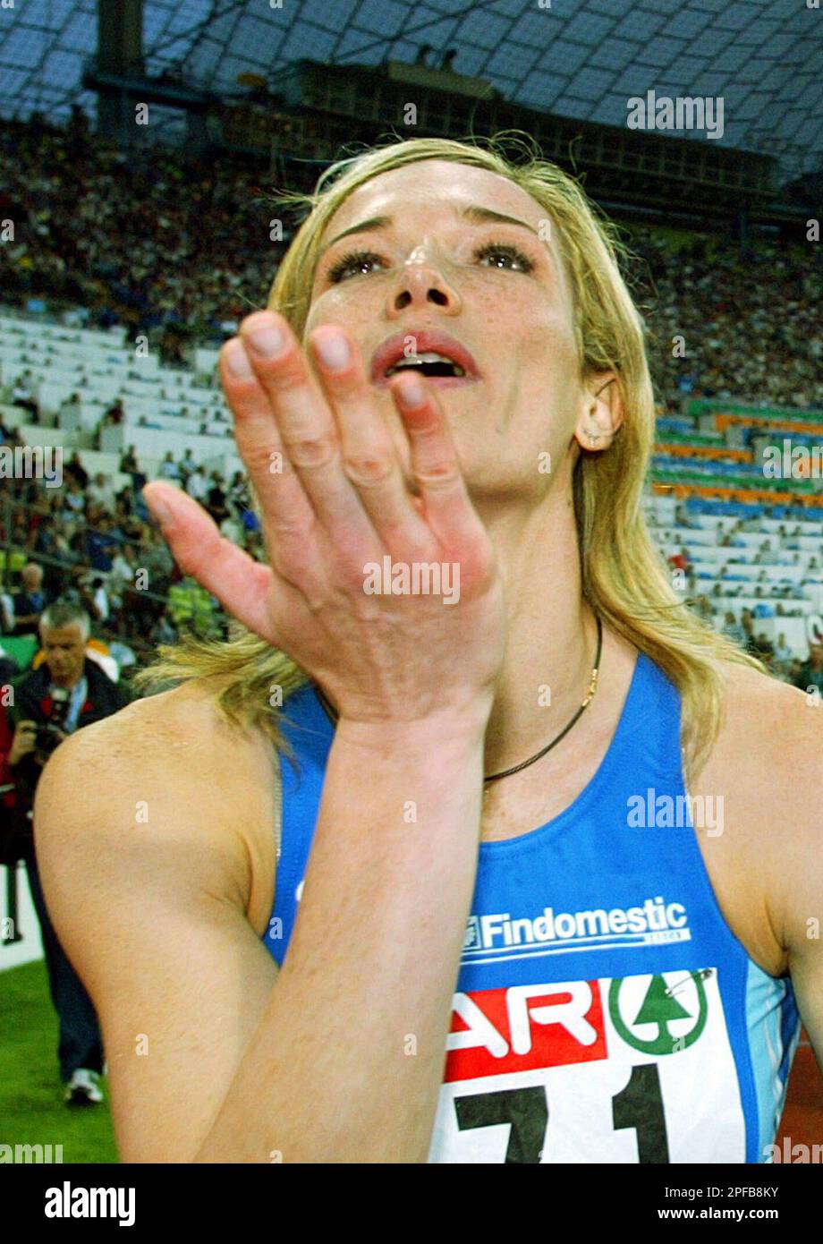 Italy's Manuela Levorato blows a kiss as she celebrates after winning ...