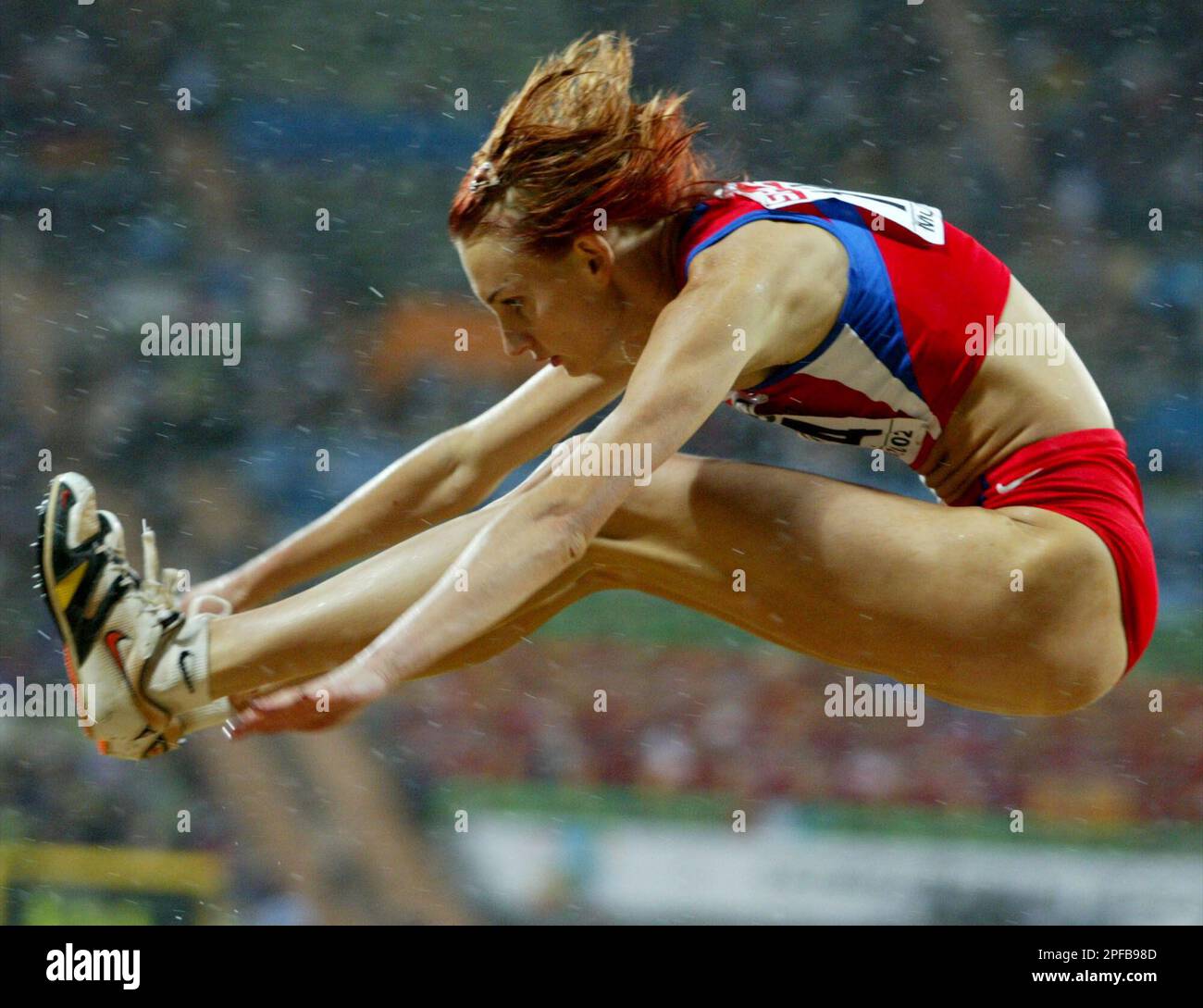 Russia's Tatyana Kotova in action to win the women's long jump final at ...
