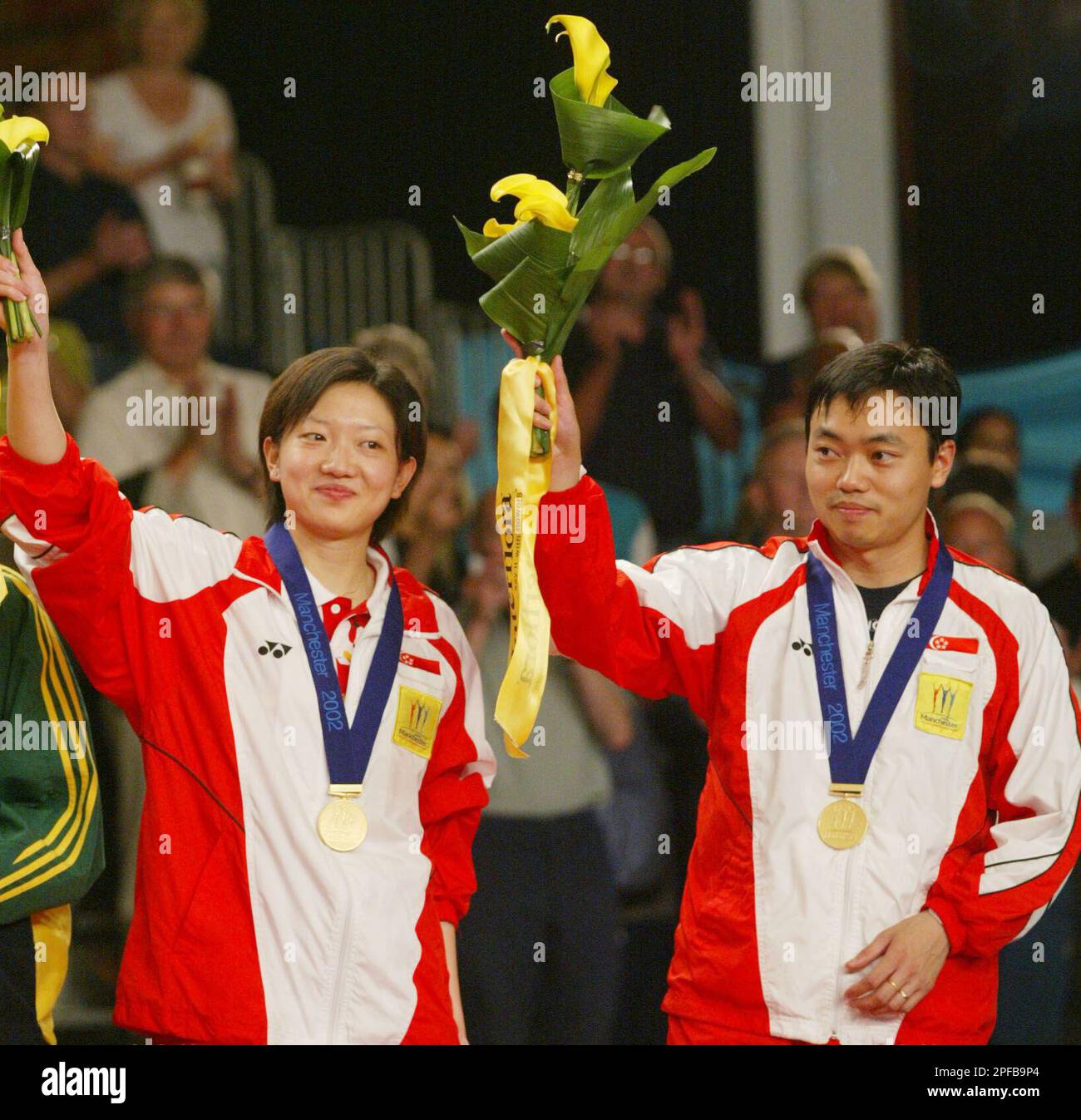 Singapore's Yong Jun Duan, right, and Jia Wei Li pose with their gold ...