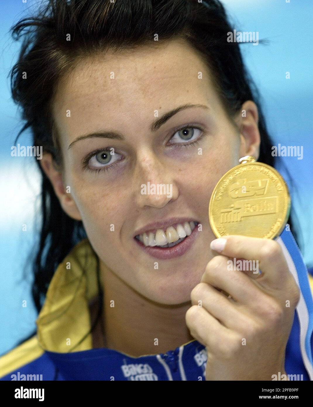 Swedish swimmer Therese Alshammar presents her goldmedal after their ...