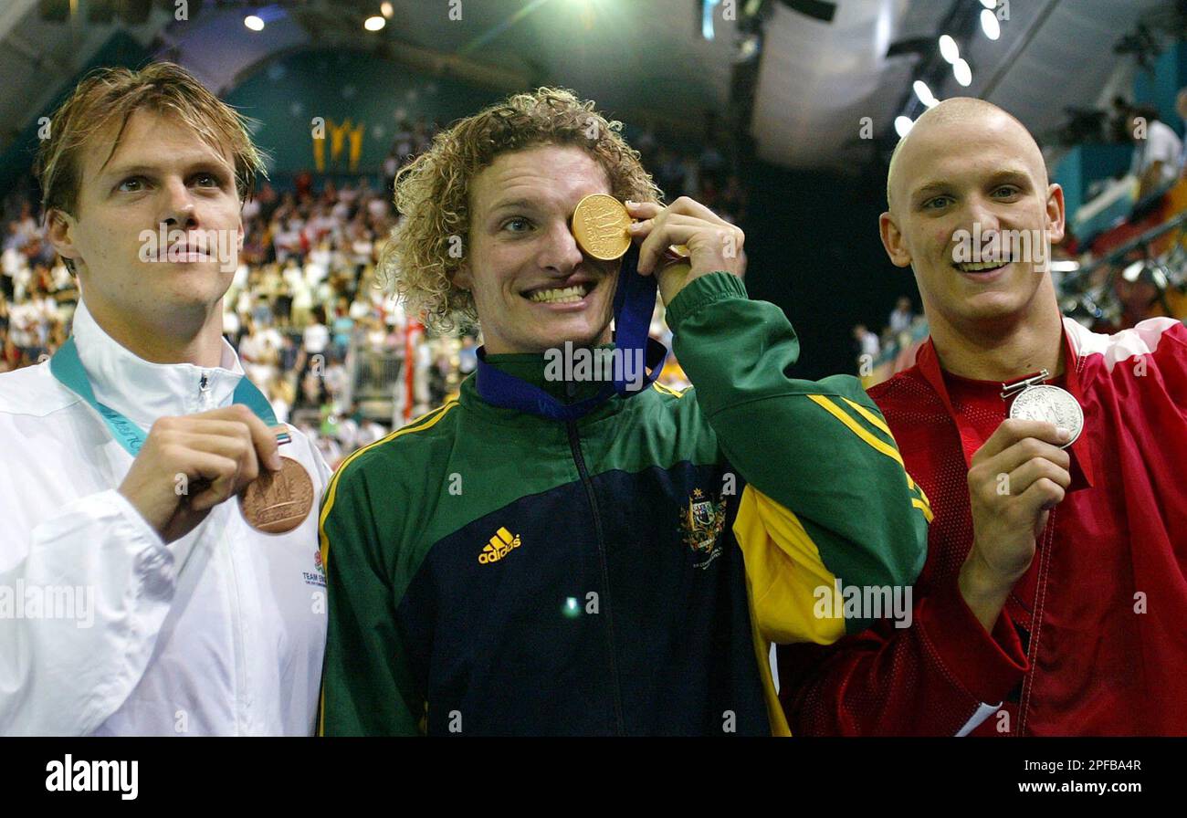 From left: England's Adrian Turner, bronze, Australia's Justin Norris ...