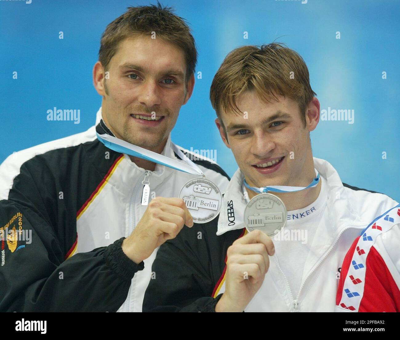 German divers Andreas Wels, right, and Thomas Schellenberg, left ...