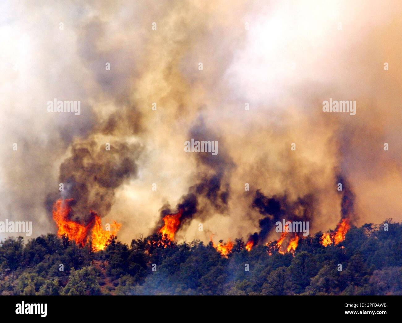 The Lost Cabin fire burns near Las Vegas, Tuesday, July 16, 2002. The ...