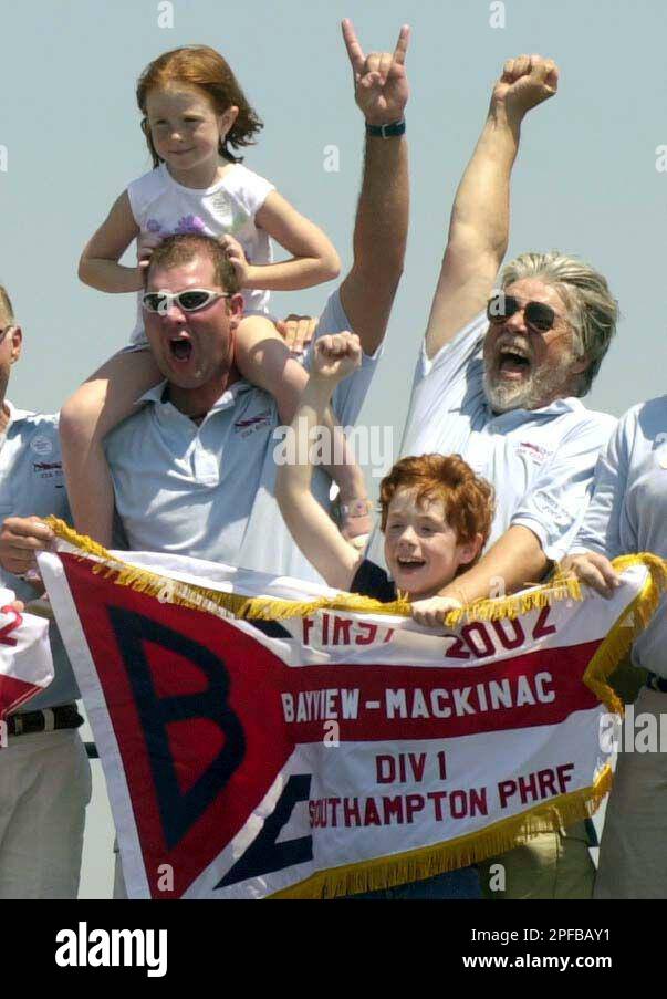 Rock star Bob Seger, above right, celebrates Tuesday, July 16, 2002 ...