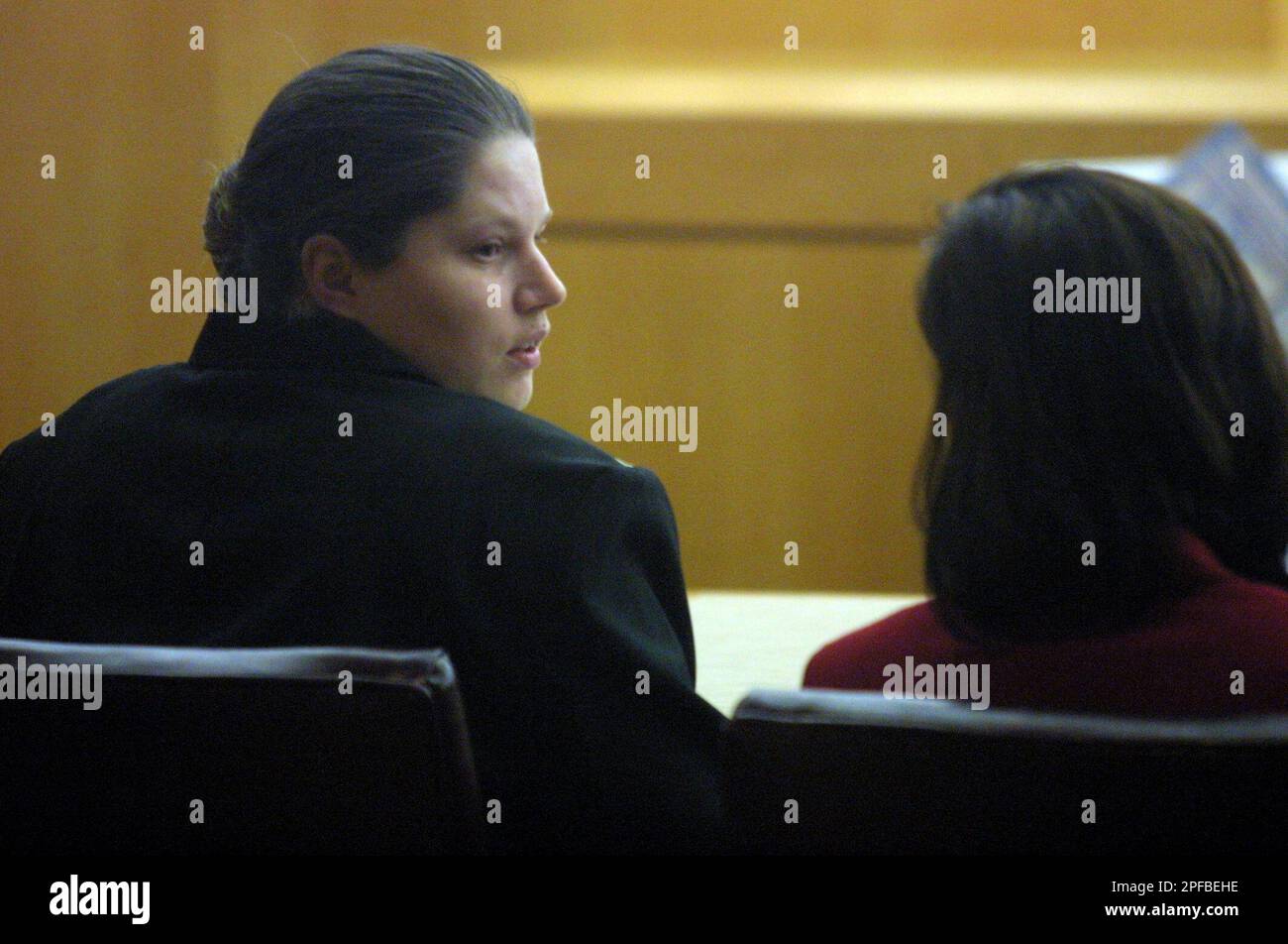 Barbara Atkinson, left, talks with her defense attorney Sindhu ...