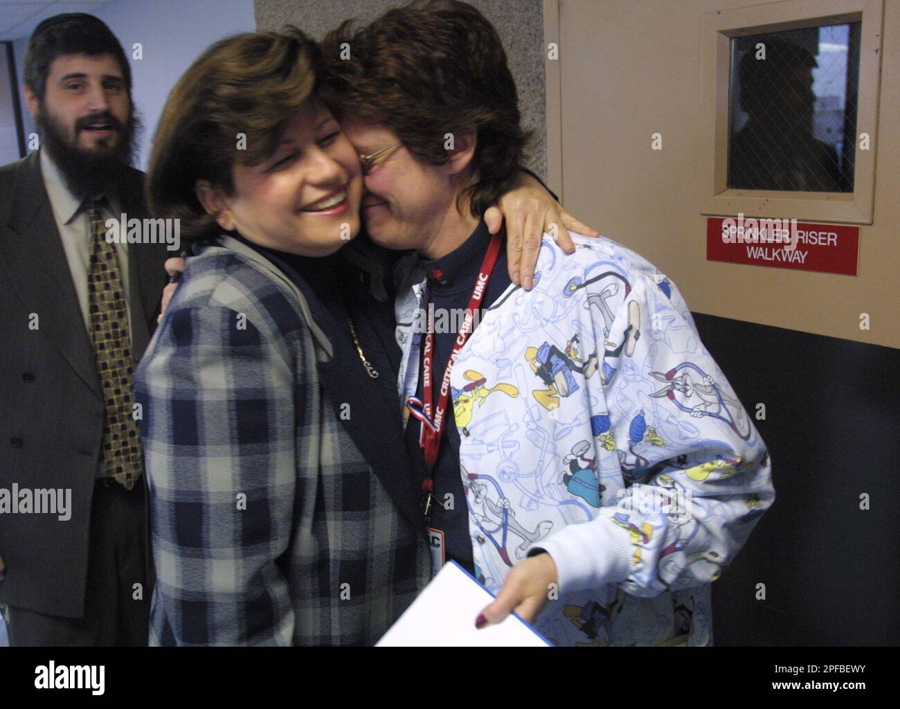 Chana Daskal's mother, Esther Braun, center, embraces University ...