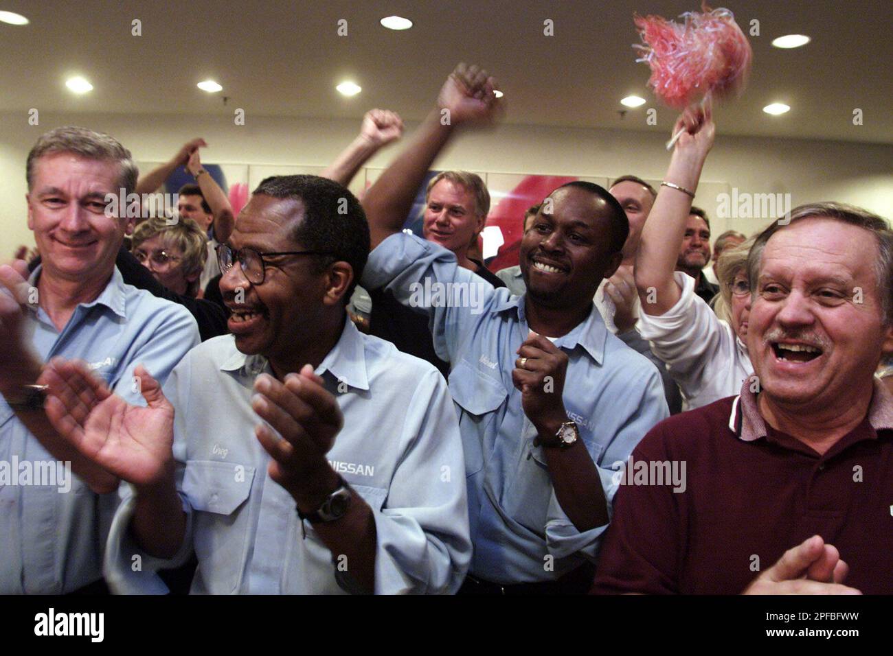 From left, Greg Daniels, Michael Lee, and Stan Zdeb celebrate after ...
