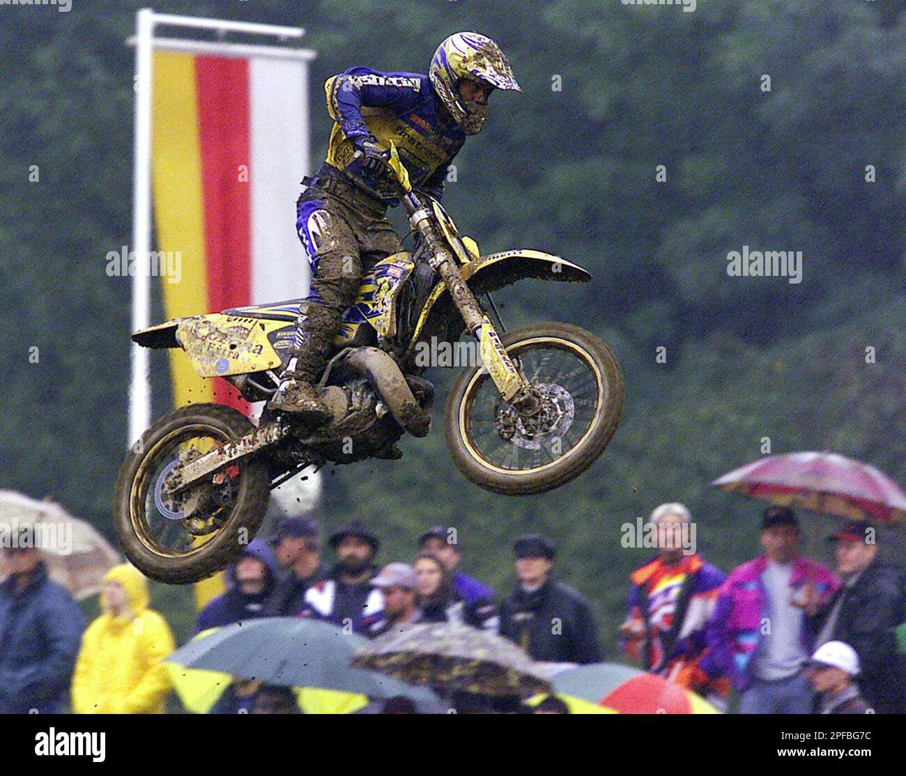 Mickael Pichon from France jumps with his Suzuki motorcycle during the ...