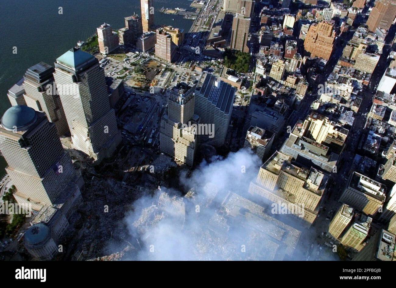 The rubble of the World Trade Center attack continues to smolder ...