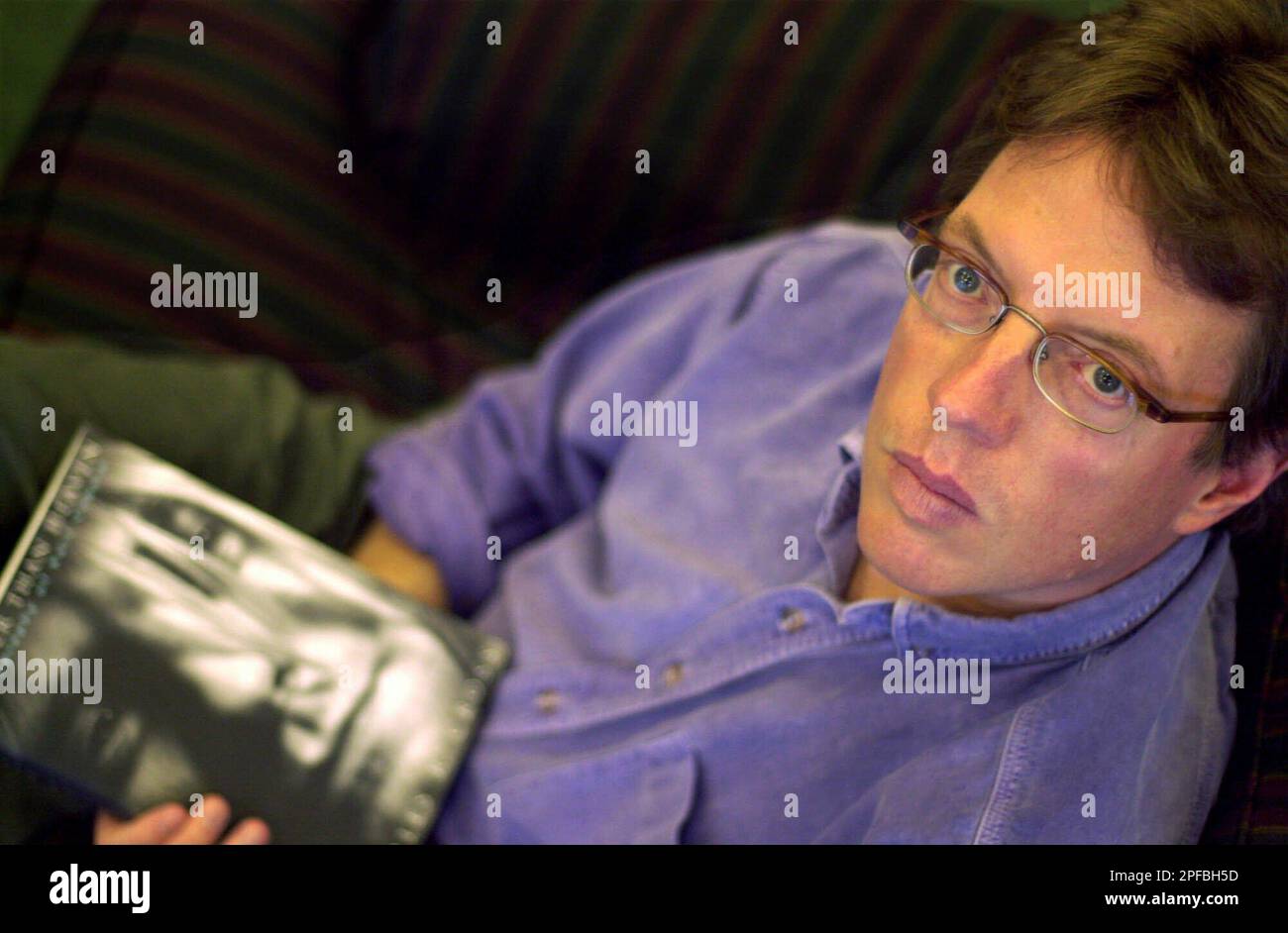 Author Charles R. Cross poses for a portrait Aug. 22, 2001, in Seattle ...