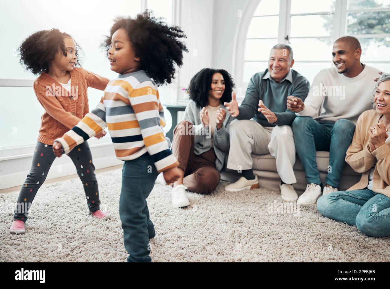 Happy family, children dancing and living room with parents ...