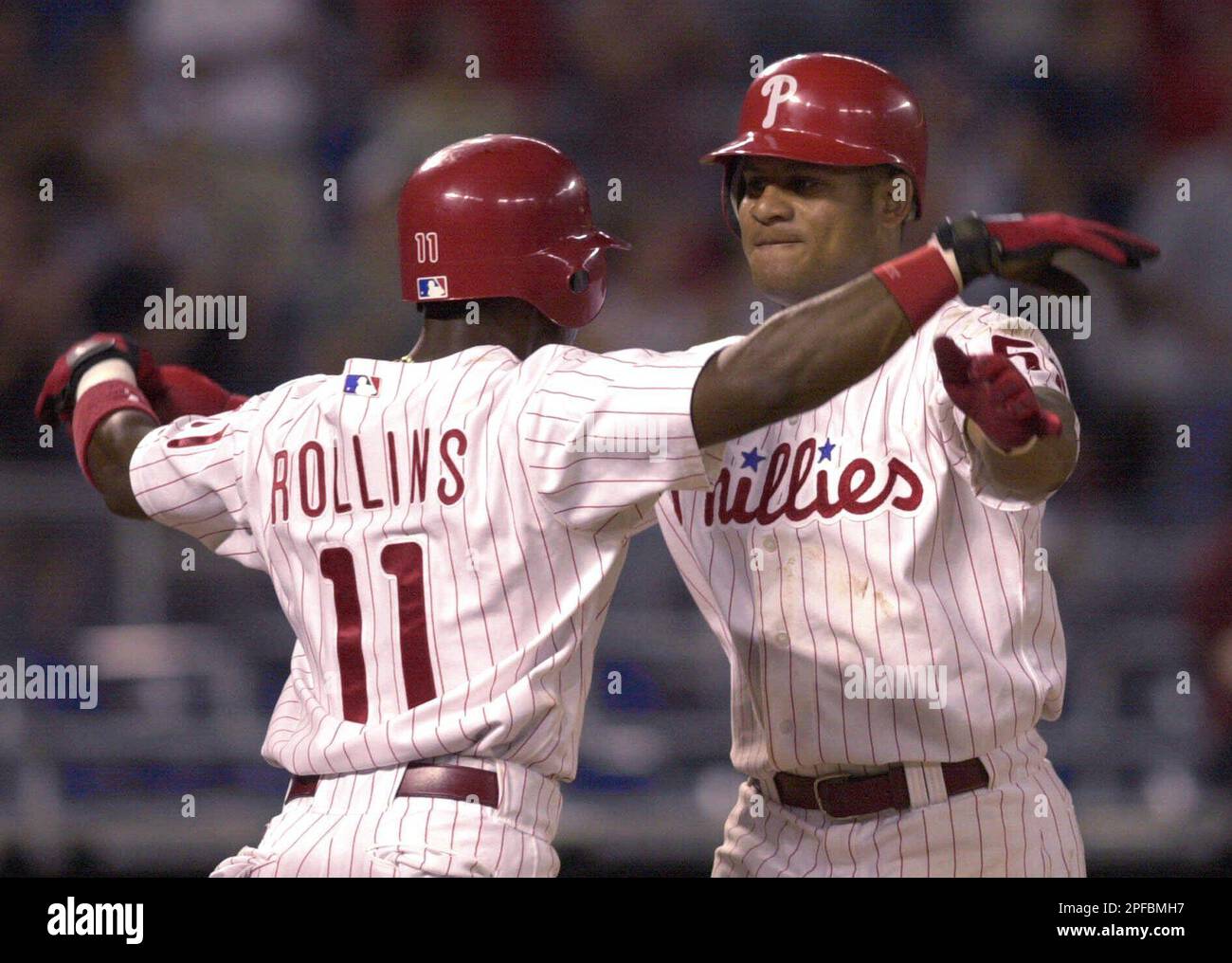 Philadelphia Phillies' Bobby Abreu, right, is congratulated by teammate ...