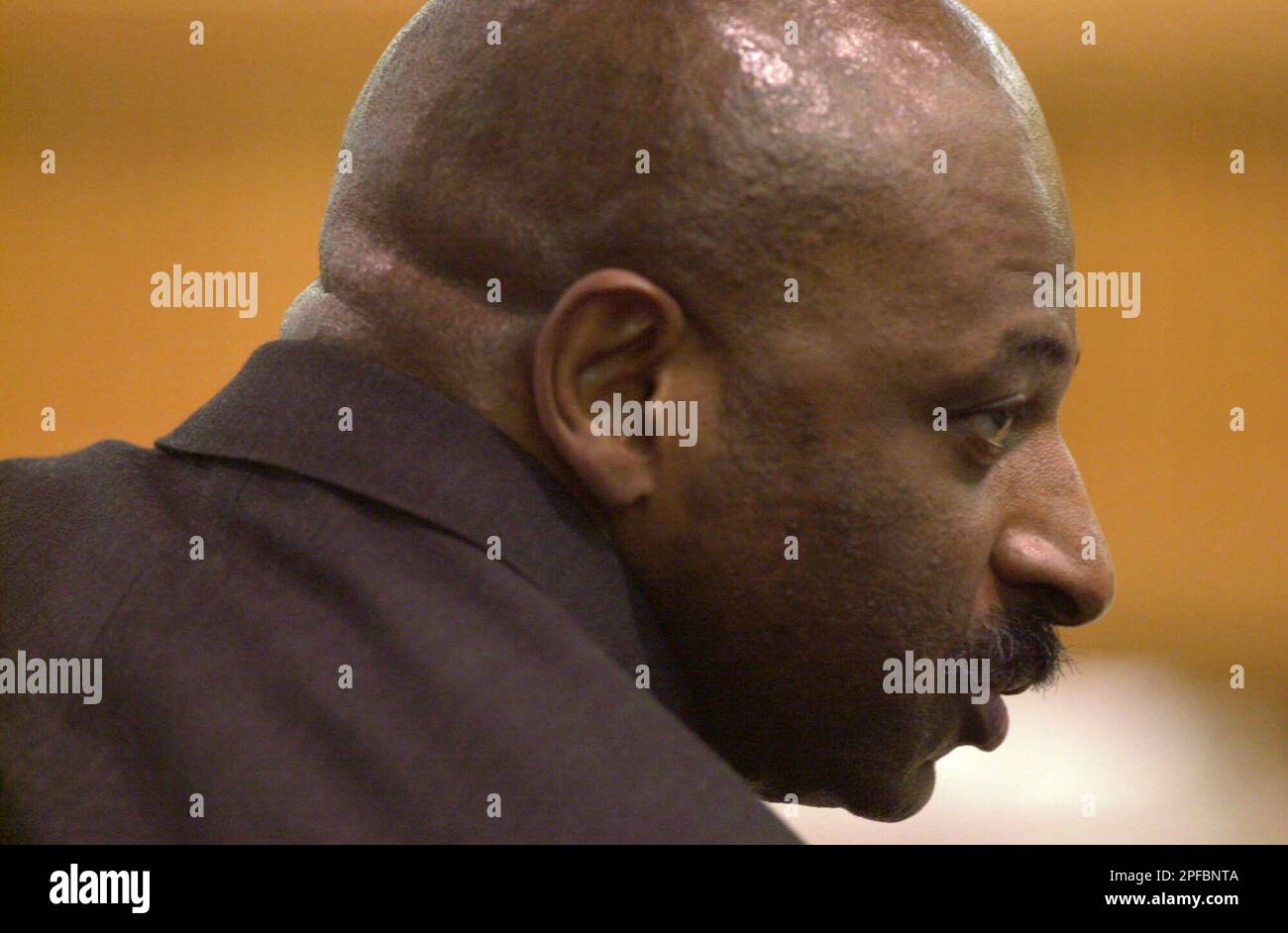 Death row inmate Ambrose Harris leans over to talk to his lawyer during ...