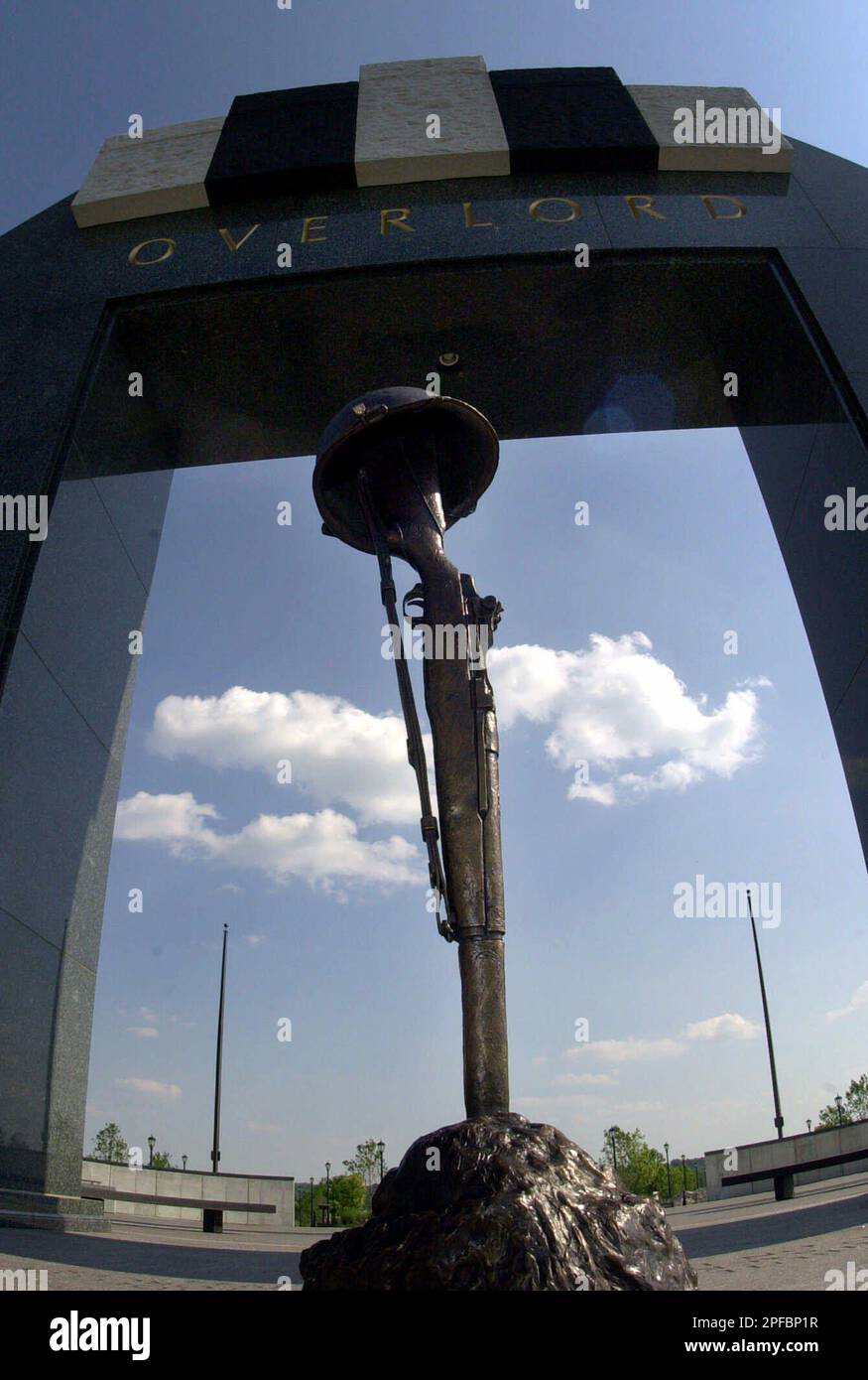 A sculpture by Jim Brothers depicts a soldier's M1 rifle with helmet ...