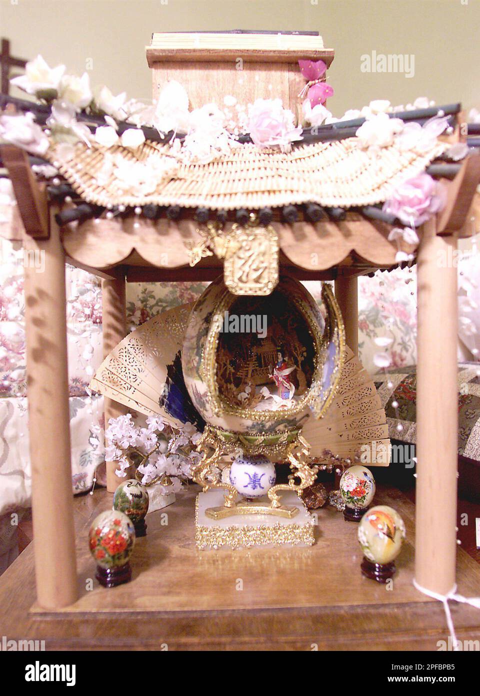 This depiction of "Madame Butterfly" in a Faberge egg shows the detail ...