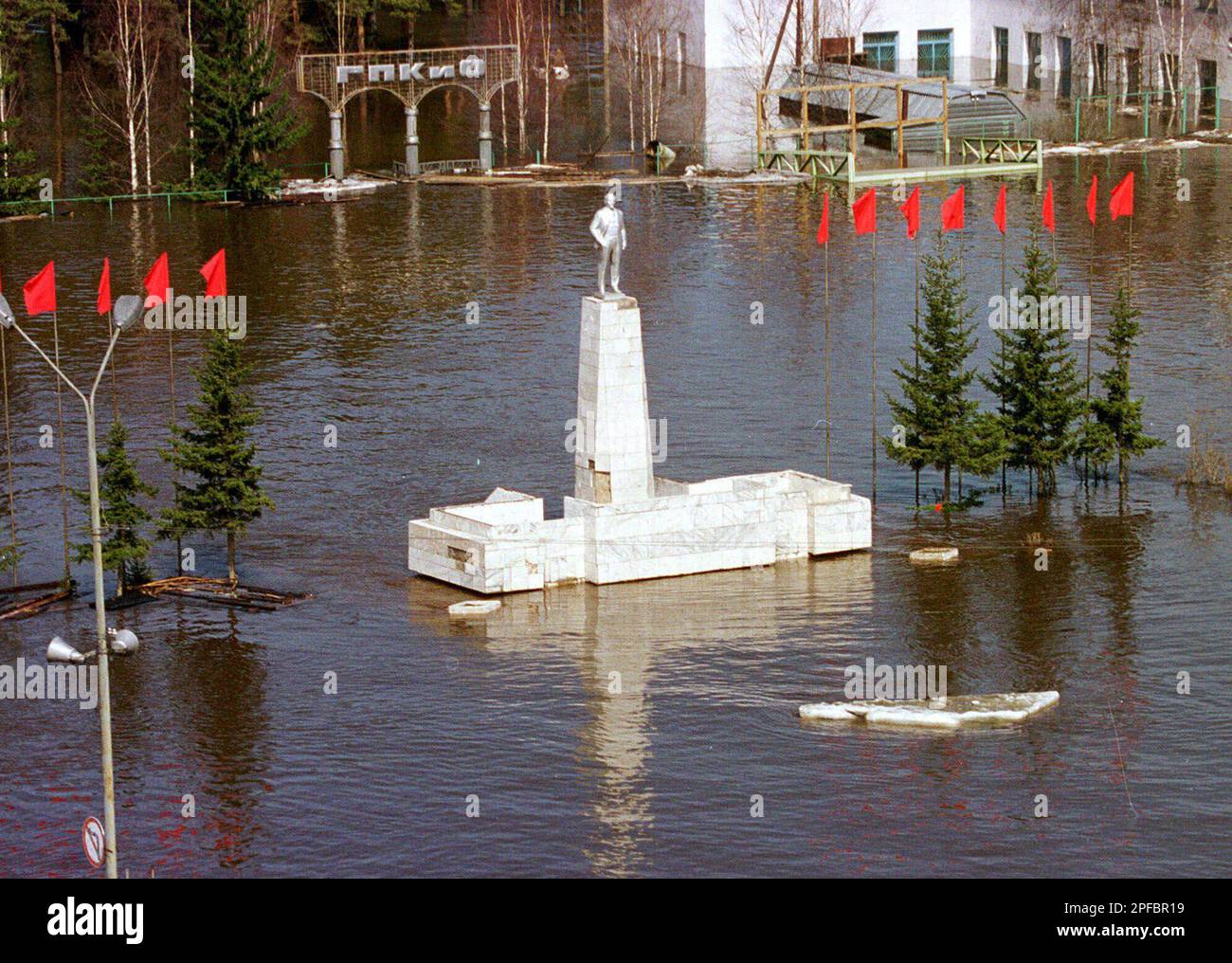 A statue of Soviet leader Vladimir Lenin overlooks the flooded eastern ...