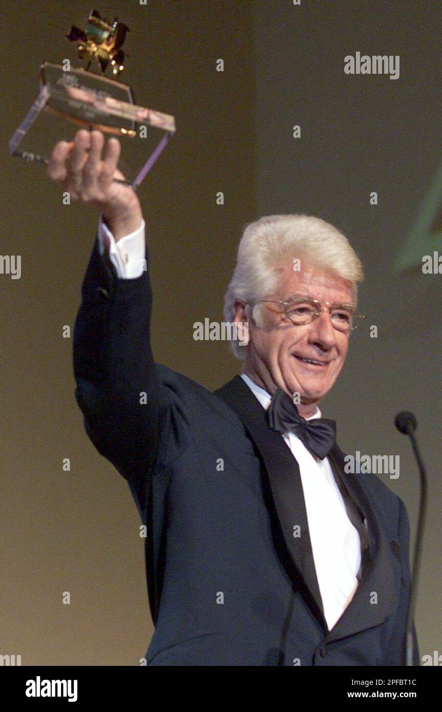 Dutch entertainer Rudi Carrell holds the honorary 'Golden Rose of ...