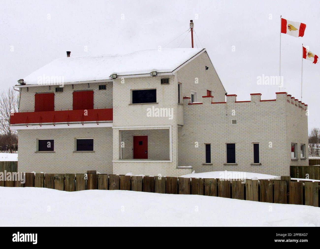 The flags of the Hells Angels biker gang fly over their fortified ...