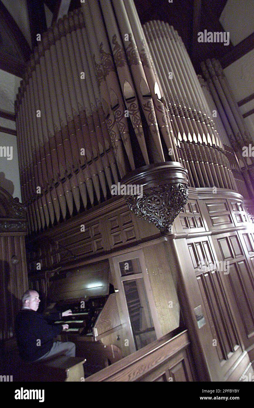 ADVANCE FOR FRIDAY MARCH 23--Organist David Andrews demonstrates the ...