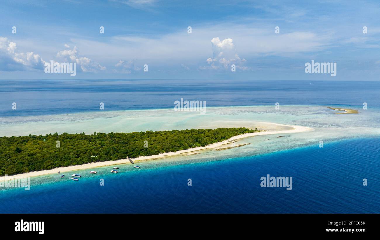 Top view of beautiful island with sandy beach in tropical sea. Mataking ...