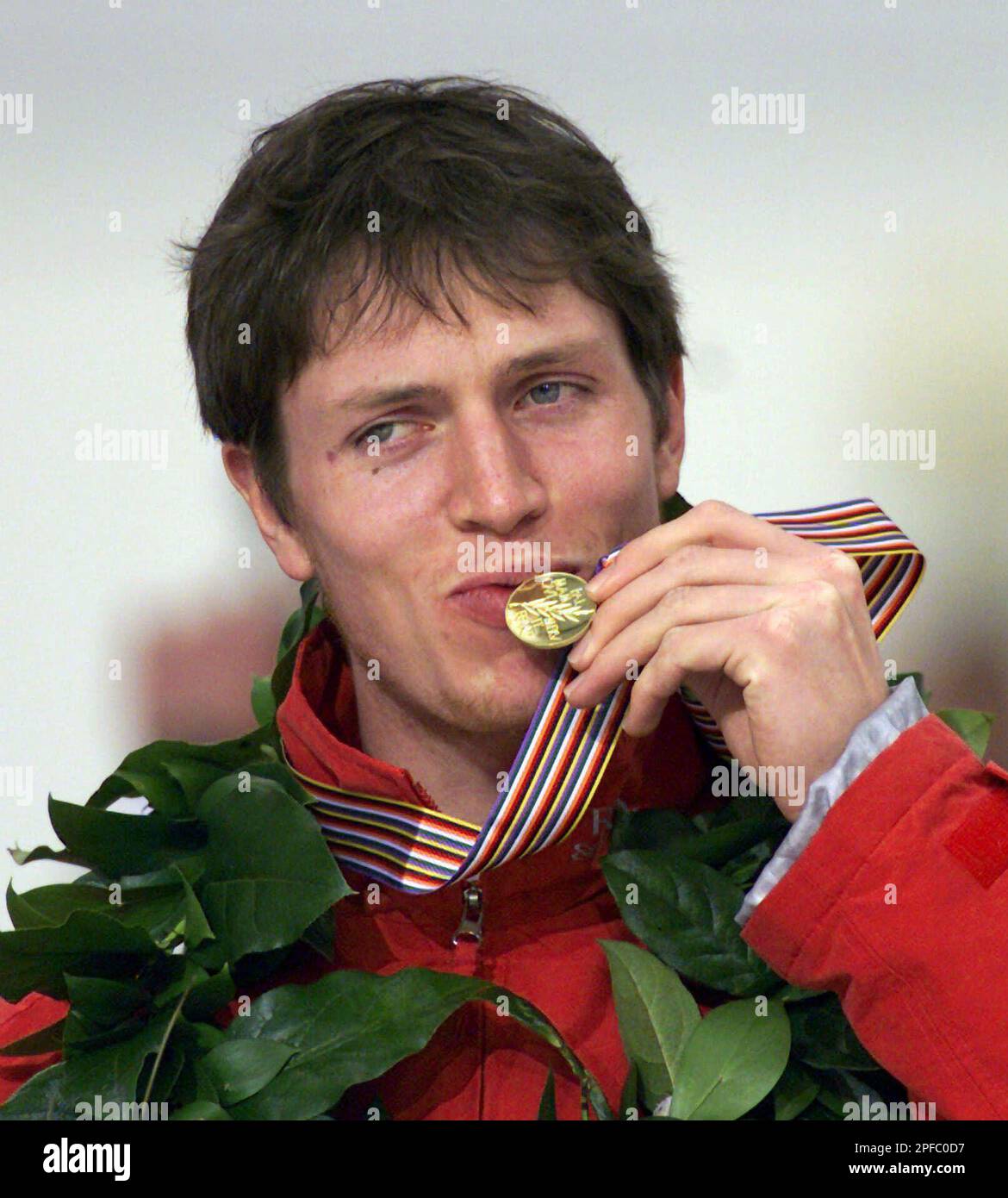 Canada's Jeremy Wotherspoon kisses the gold medal he won in the 1,000 ...