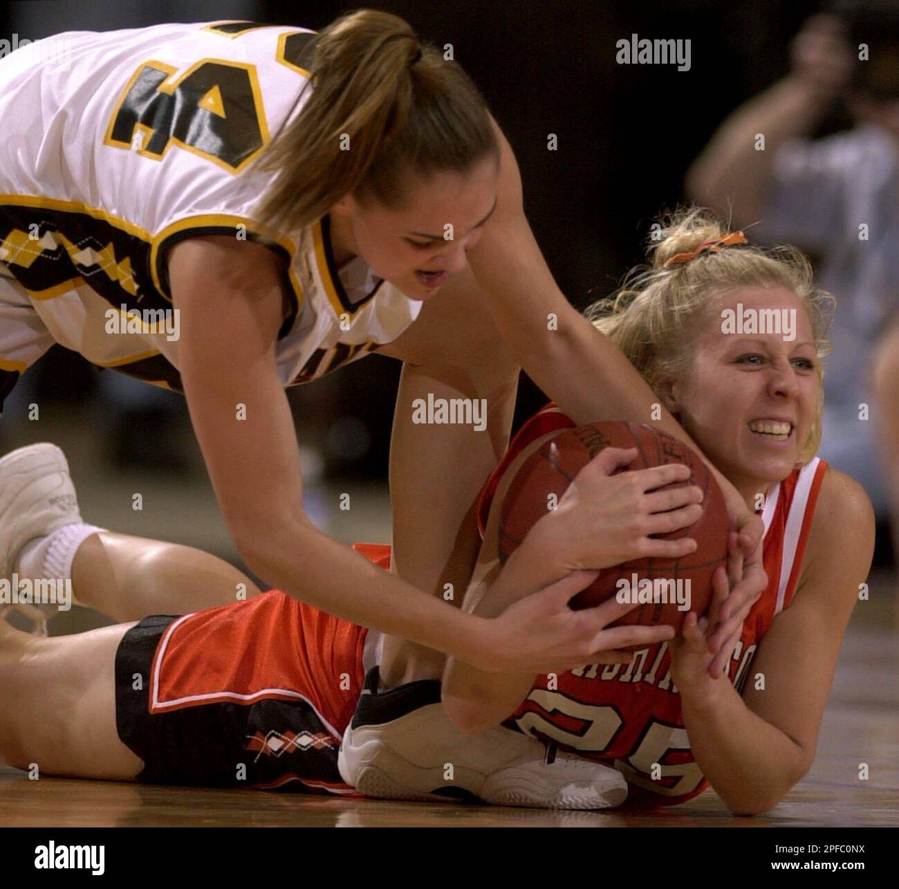 Atlantic's Jaime Hoegh, left, and Washington's Kati Roth battle for a ...