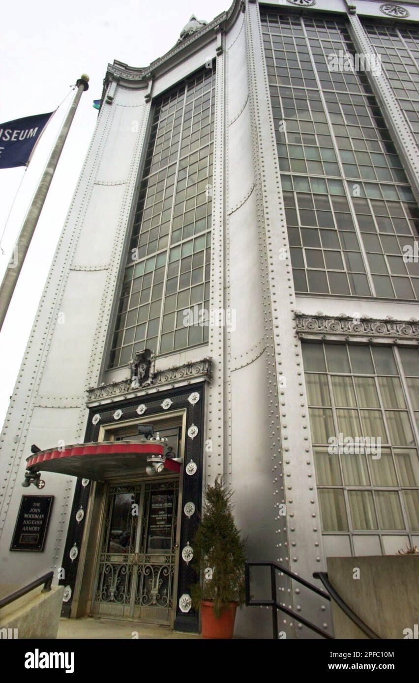 The facade of the art deco glass and steel building housing the Higgins ...