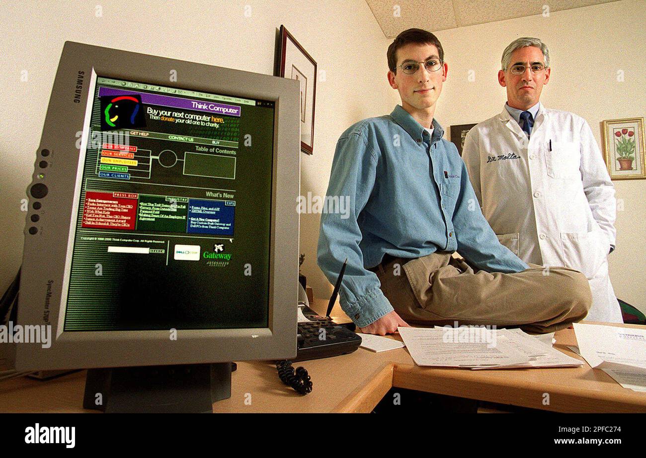 Aaron Greenspan sits next to his web page in the office of one of his ...